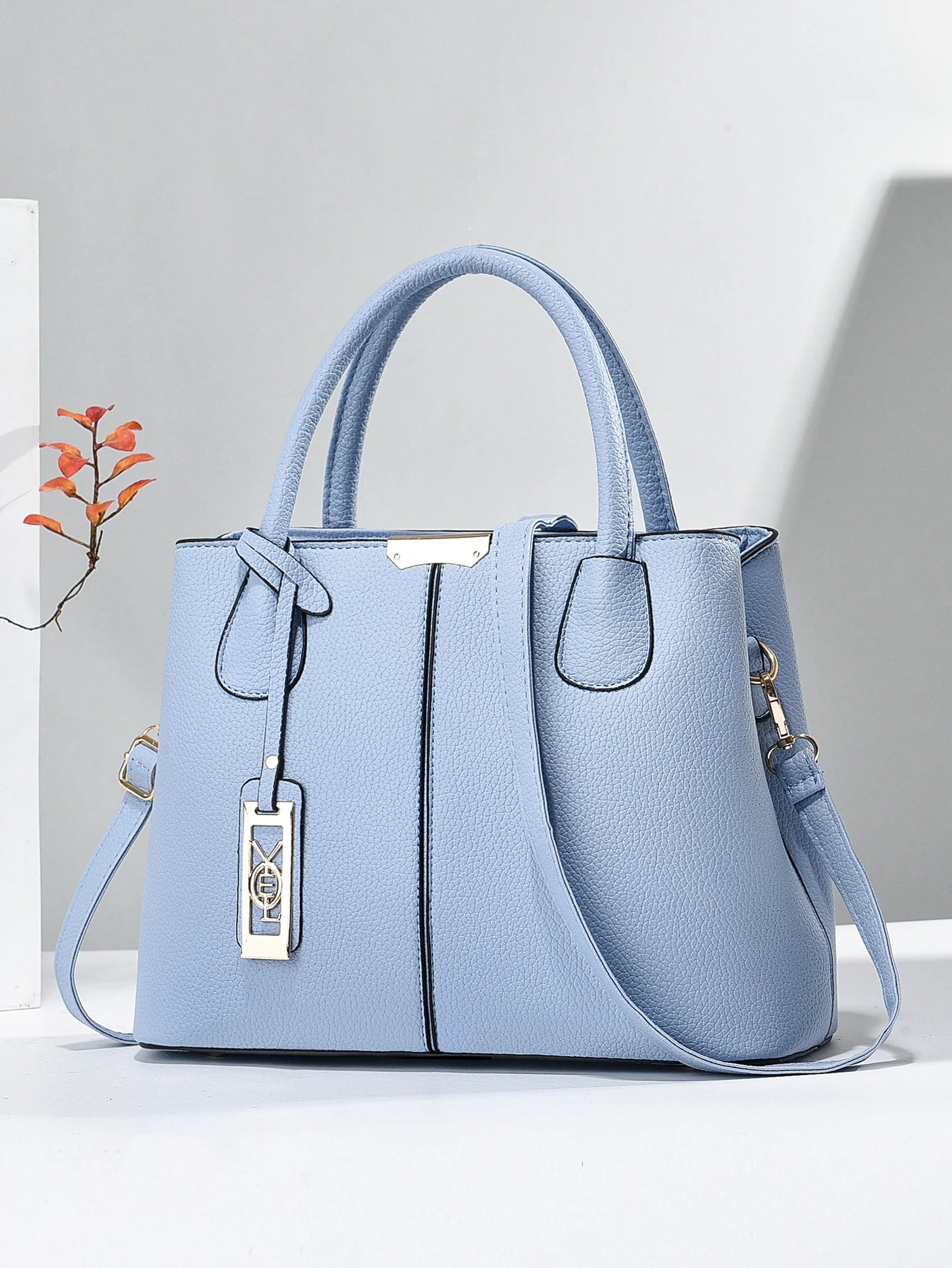Elegant Light Blue Leather Handbag With Strap on Luulla