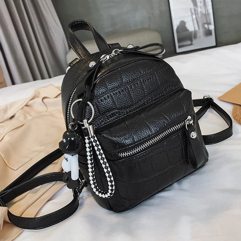 Small Black Leather Backpack With Keychain Accessory on Luulla