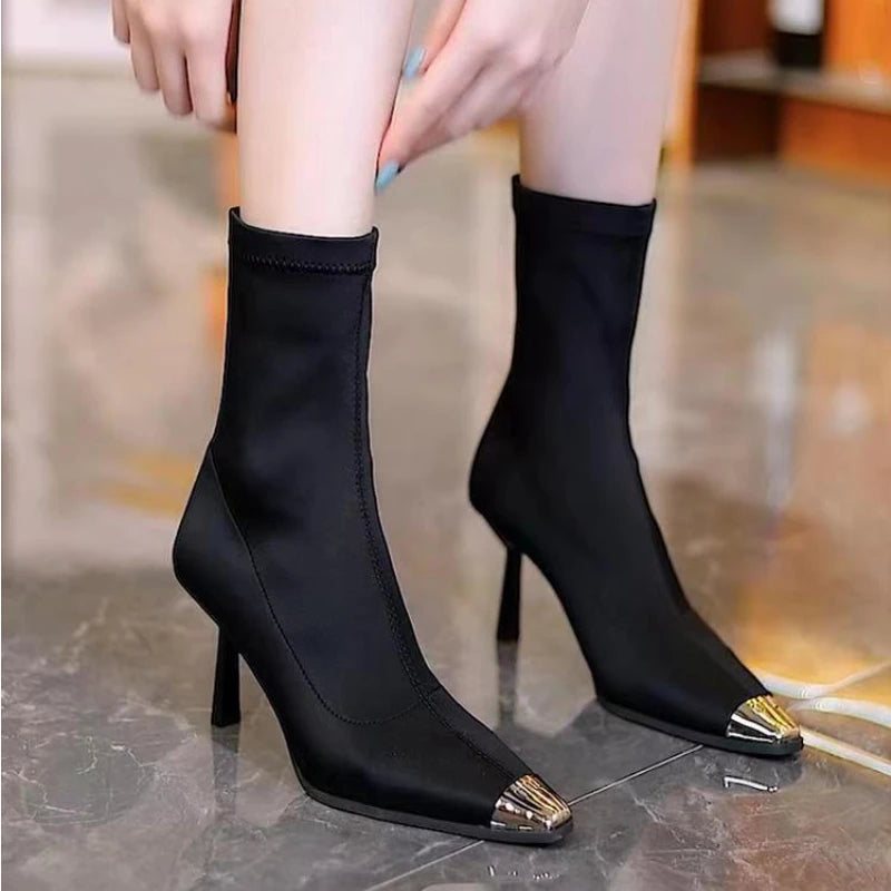 Black Stiletto Heel Boots With Metal Toe Caps on Luulla